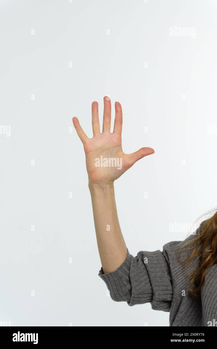 Hand gesture point five hi-res stock photography and images - Alamy
