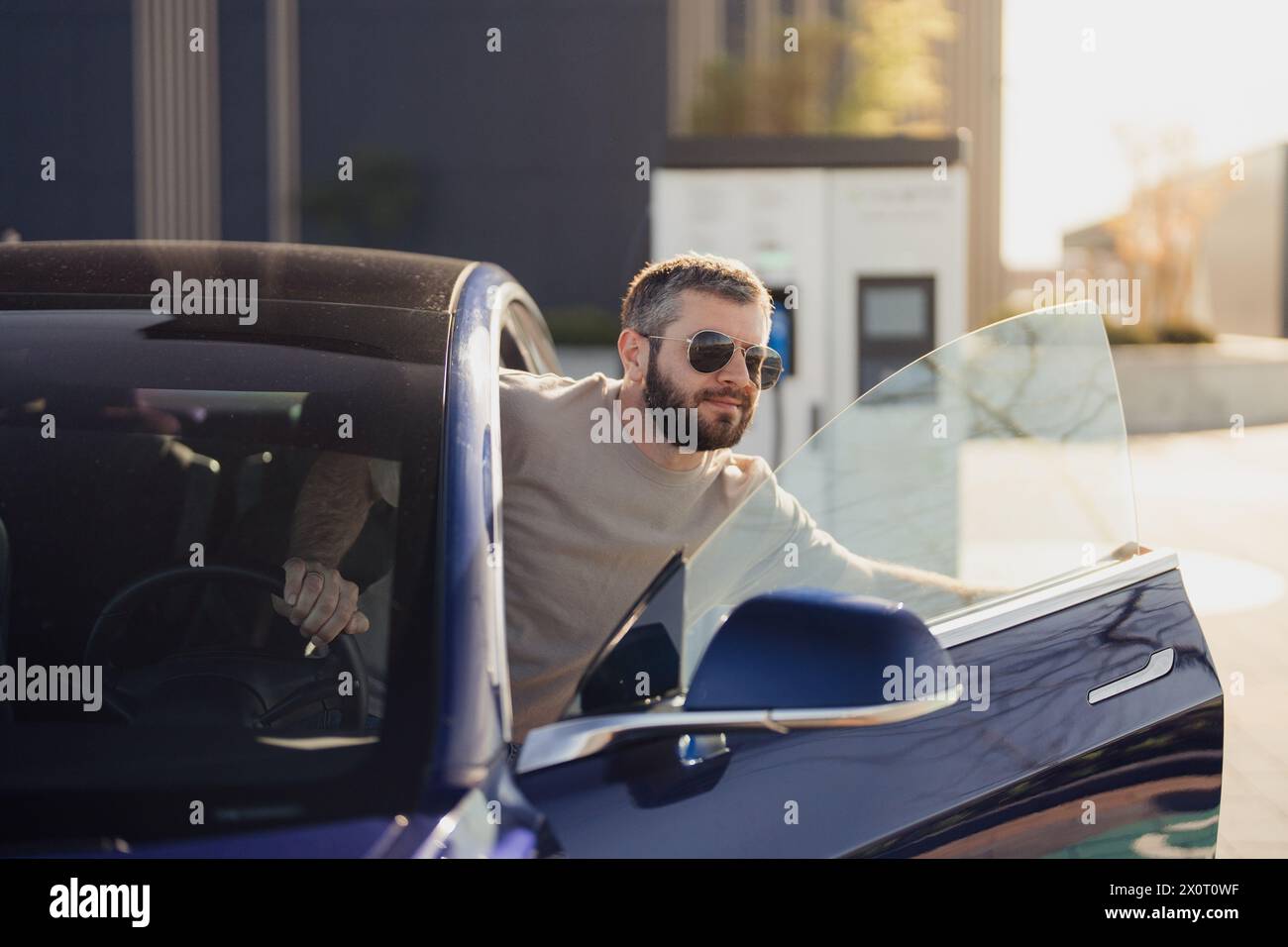 Man is stepping out of car hi-res stock photography and images - Alamy