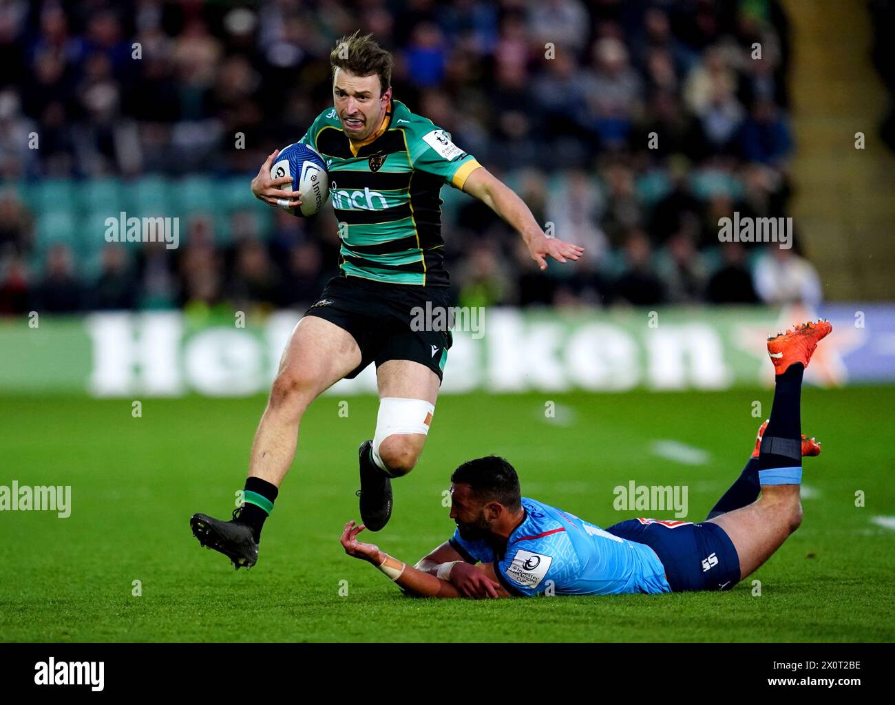 Northampton Saints' James Ramm (left) gets away from Vodacom Bulls ...