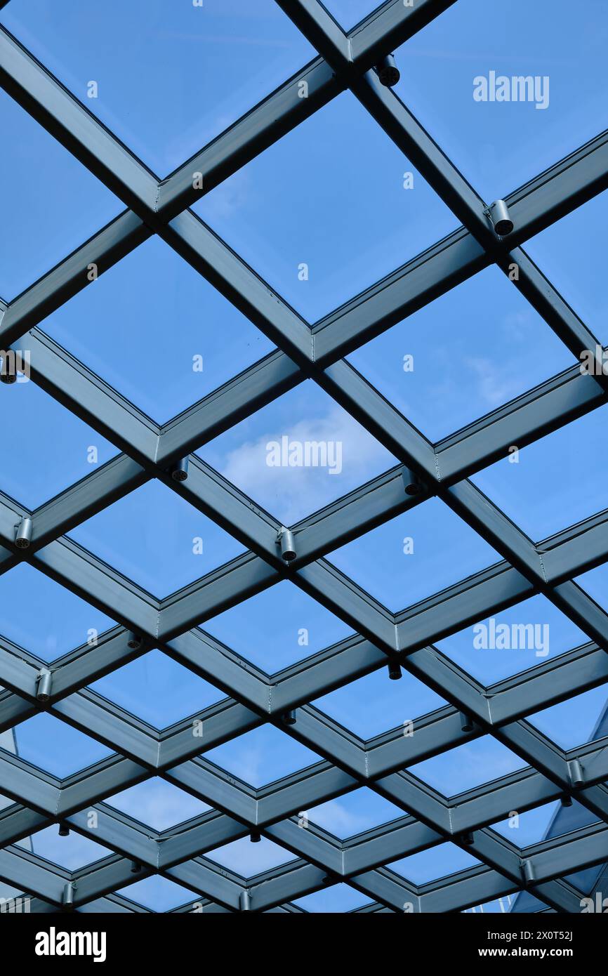 Below view of glass roof consisting of square and triangle segments ...