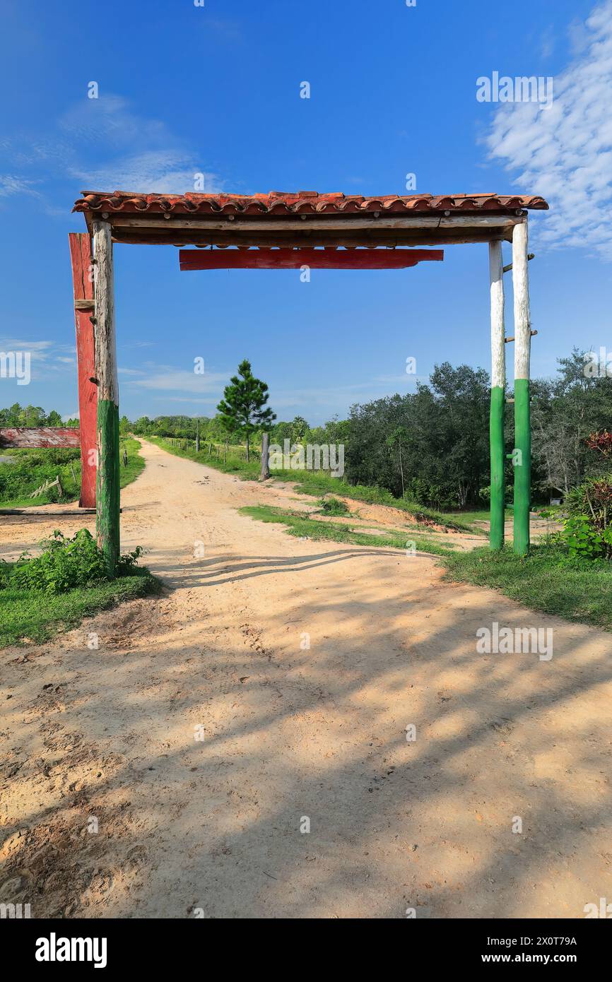 168 Entrance arch made of wooden beam and posts with red tile roof ...