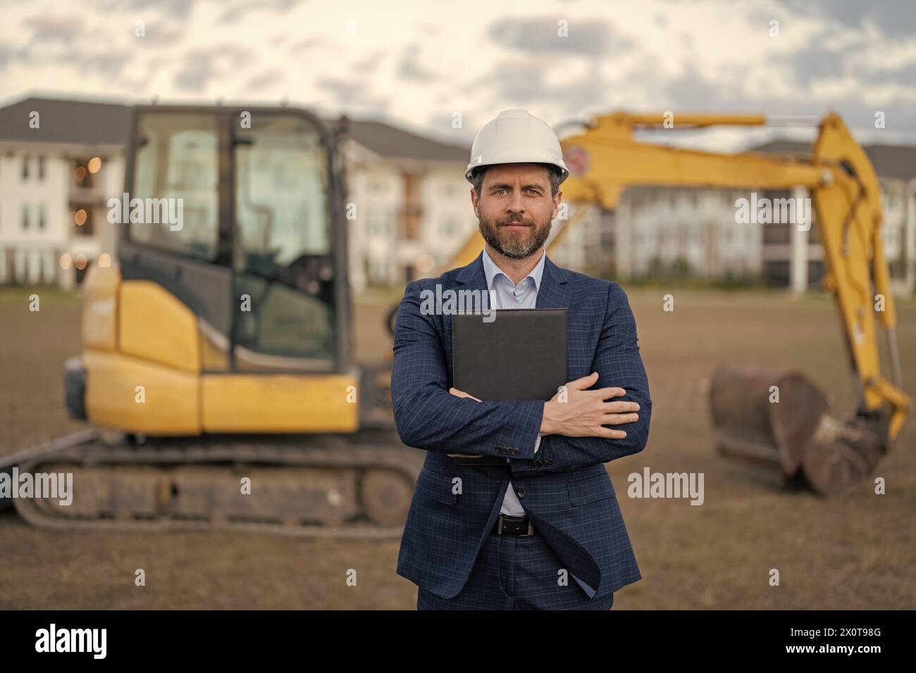 confident construction inspector engineer architecting at site ...