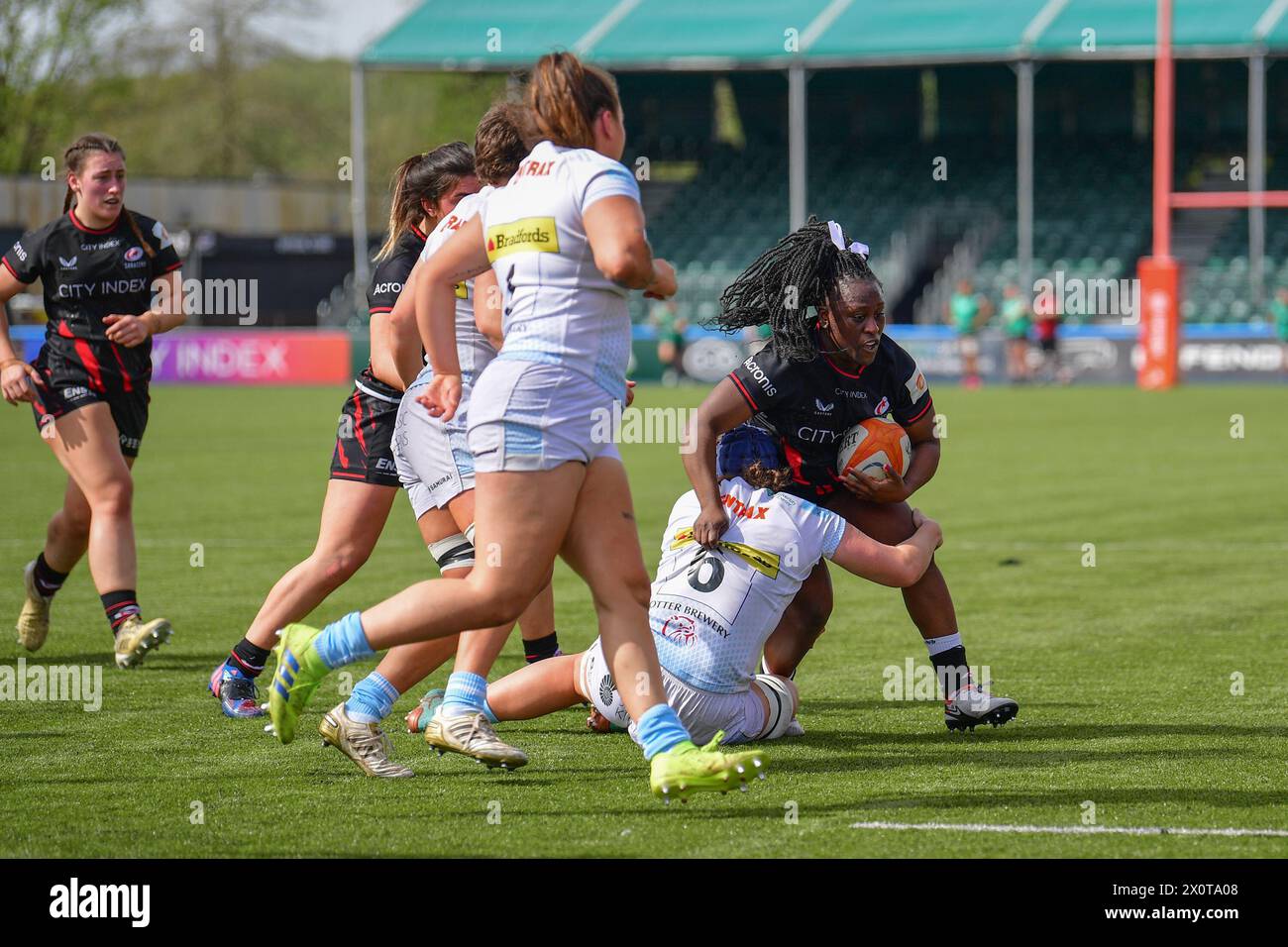 Akina Gondwe of Saracens Women is tackled by Ebony Jefferies of Exeter ...