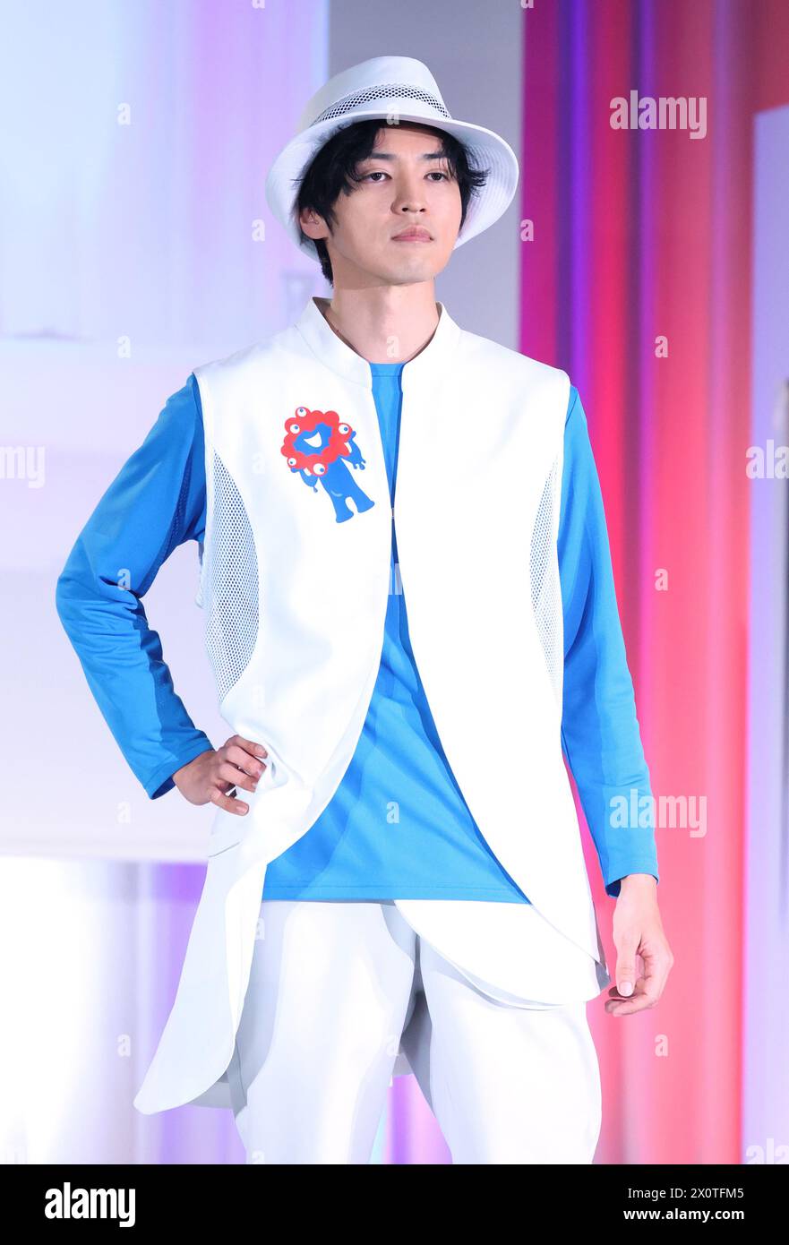 Tokyo, Japan. 13th Apr, 2024. A model displays an official uniform of ...