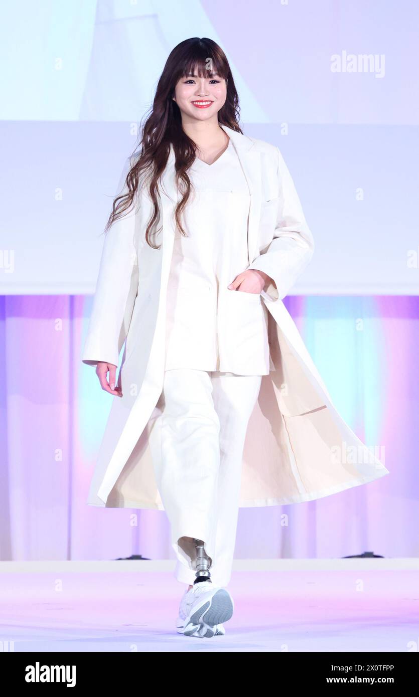 Tokyo, Japan. 13th Apr, 2024. A model displays an official uniform of ...