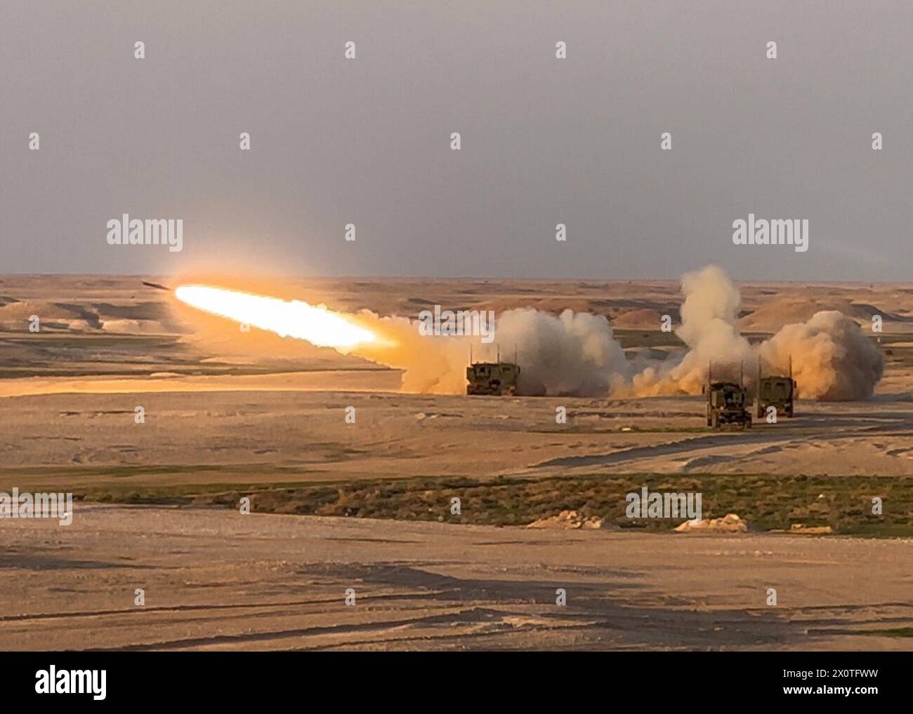 A U.S. Army M142 HIMARS (High Mobility Artillery Rocket System) fires ...