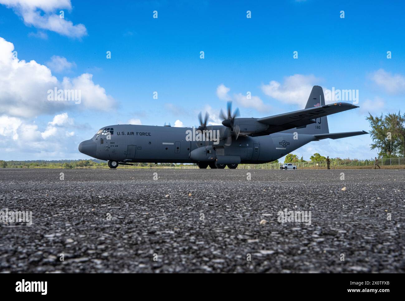 A C-130 Hercules out of Yokota Air Base, Japan, arrives with cargo and ...