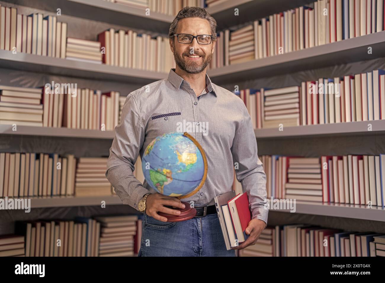 school teacher professor in classroom preparing for exam of geography ...