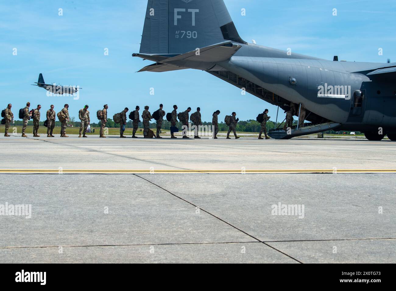 U.S. Air Force Airmen load an HC-130J Combat King II assigned to the 71st Rescue Squadron in ...