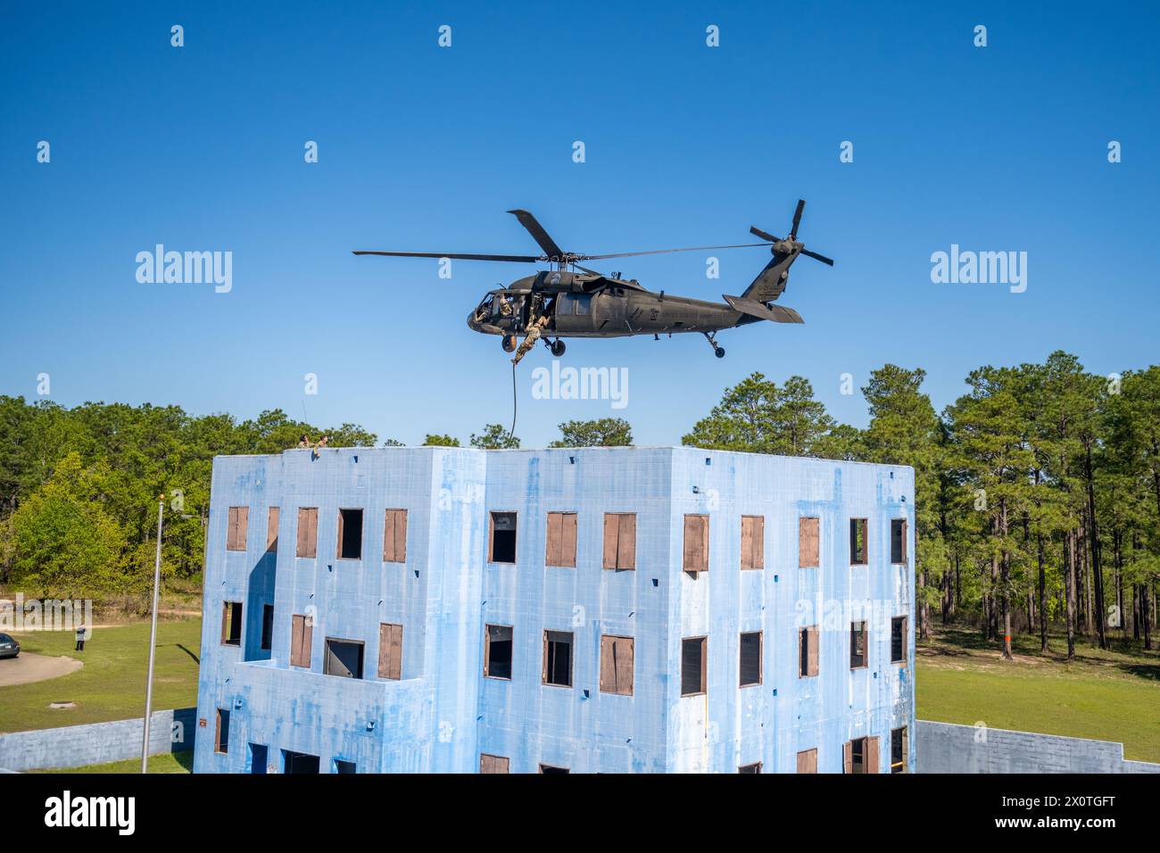 2024 Best Ranger Competition competitors fast rope from a UH-60 ...