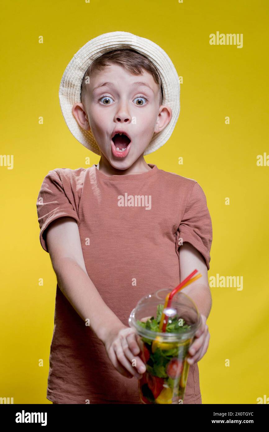 Boy drinking from plastic cup hi-res stock photography and images - Alamy
