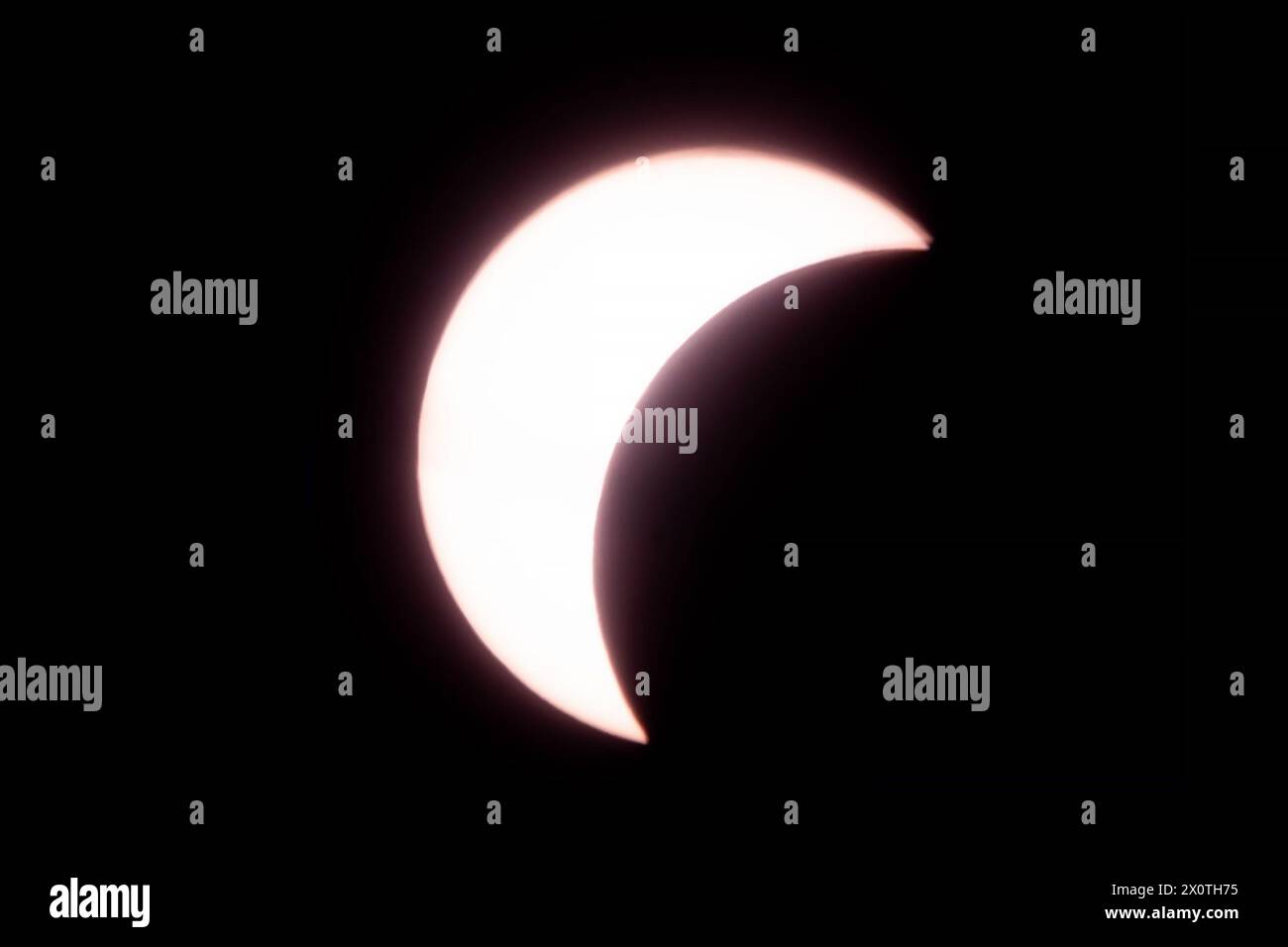 Partial solar eclipse high contrast close up isolated Stock Photo - Alamy