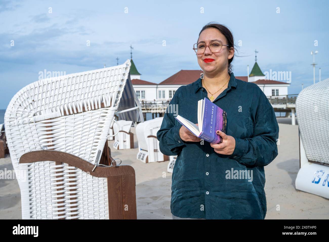 Heringsdorf, Germany. 13th Apr, 2024. Ronya Othmann, author, stands in ...