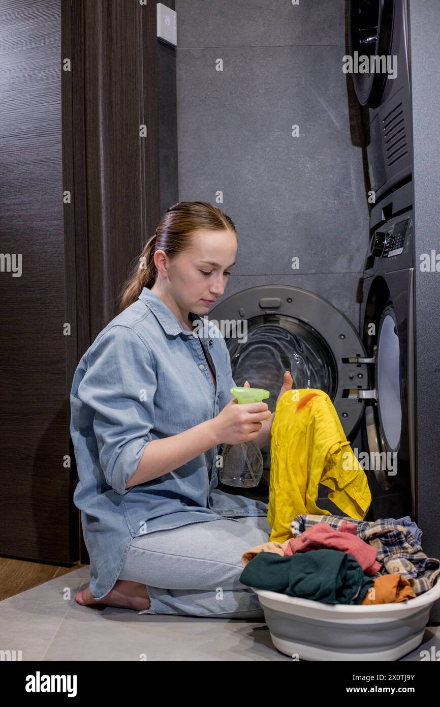 Adding detergent hi-res stock photography and images - Alamy