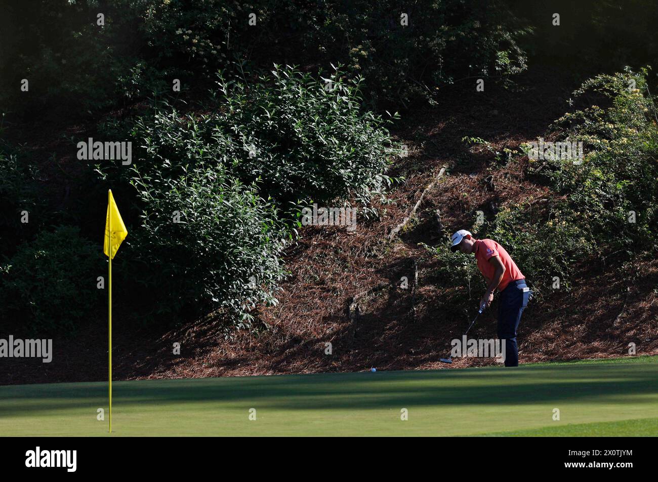 Augusta, United States. 13th Apr, 2024. Collin Morikawa putts on the ...
