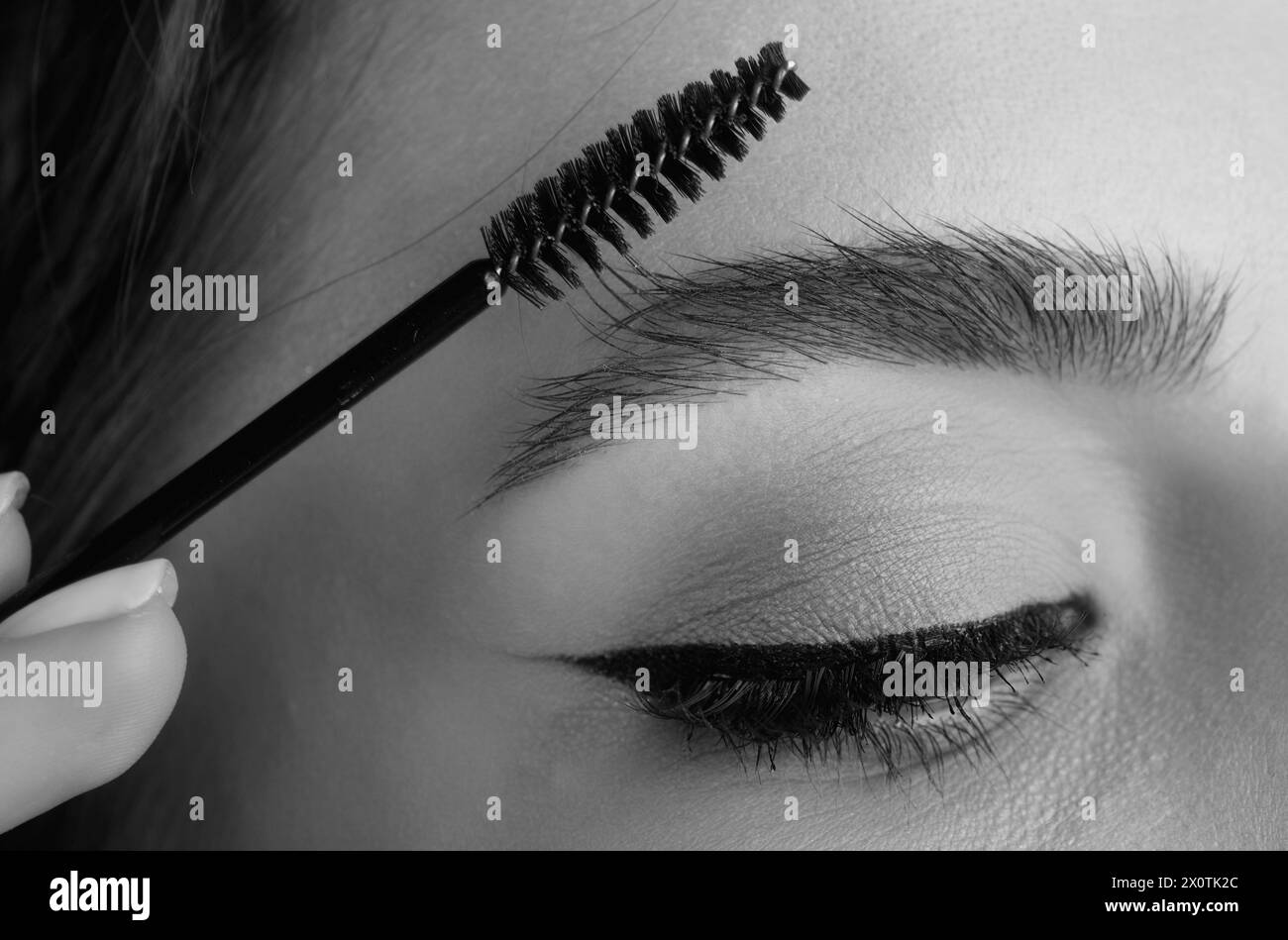 Closeup eyebrows with eyebrow brush. Close up brows, eyebrows lamination. Brow procedures. Long ...