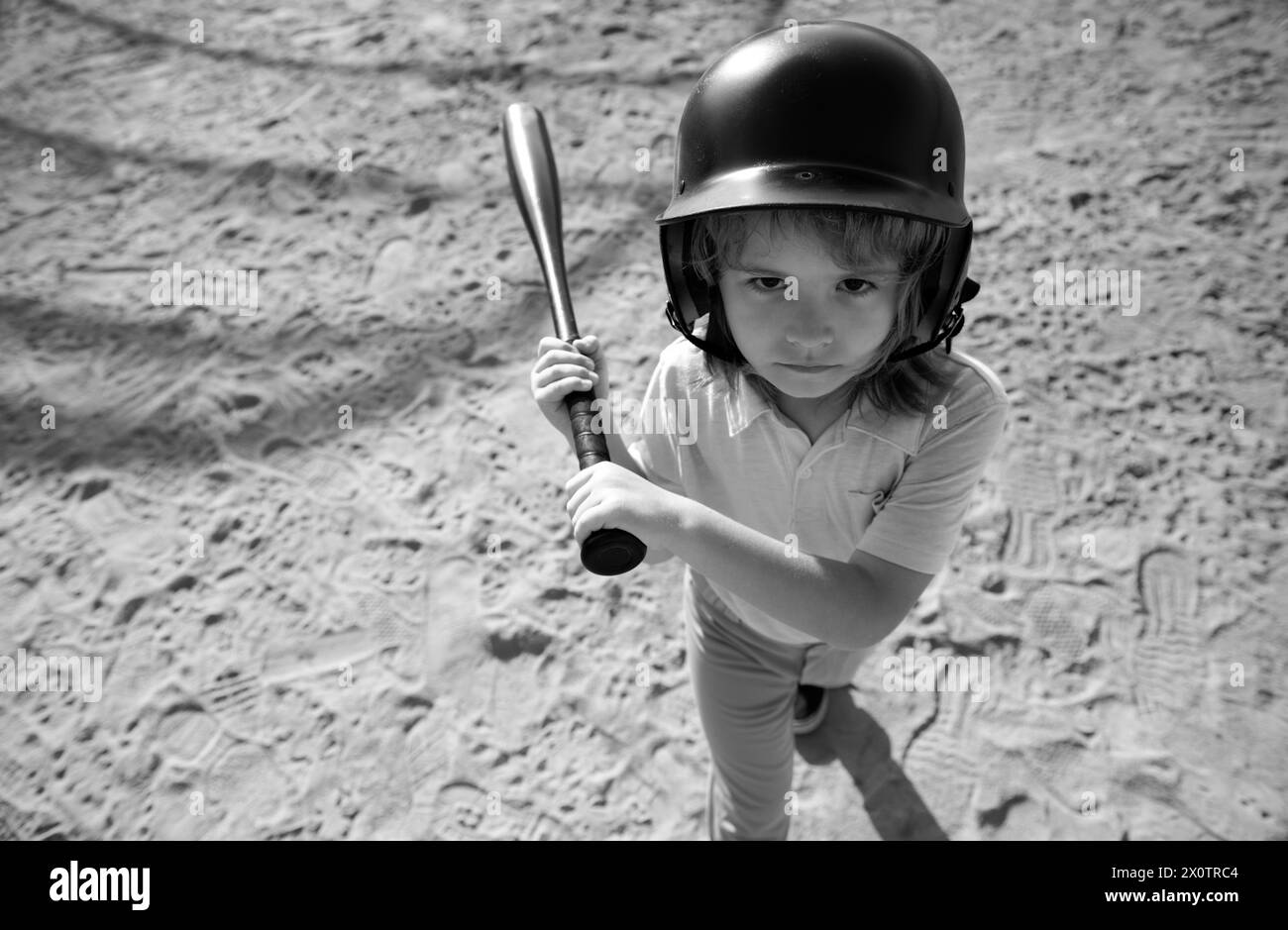 Kid holding a baseball bat. Pitcher child about to throw in youth ...