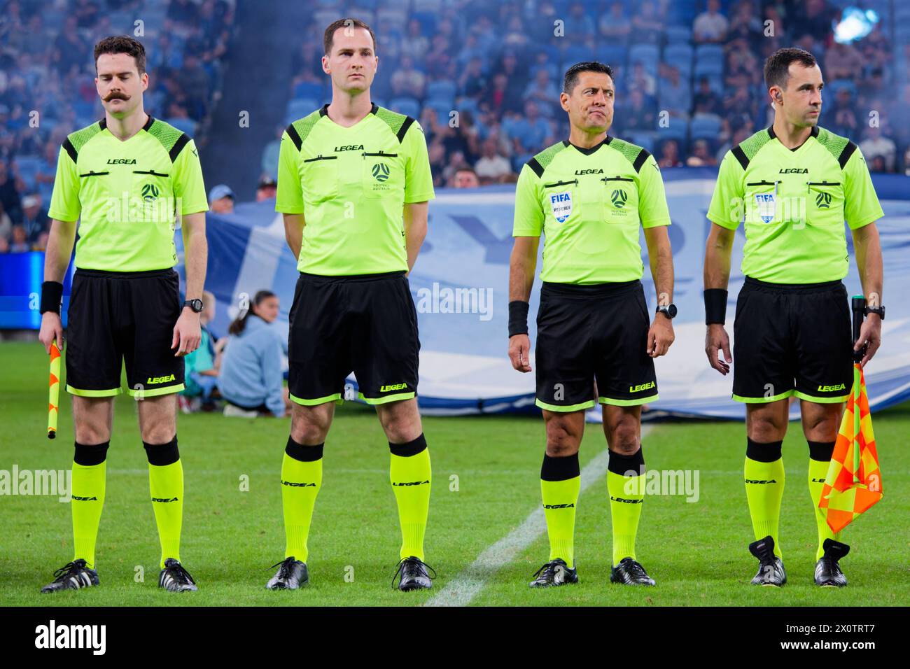 Sydney, Australia. 13th Apr, 2024. Match Referees line up on the pitch ...