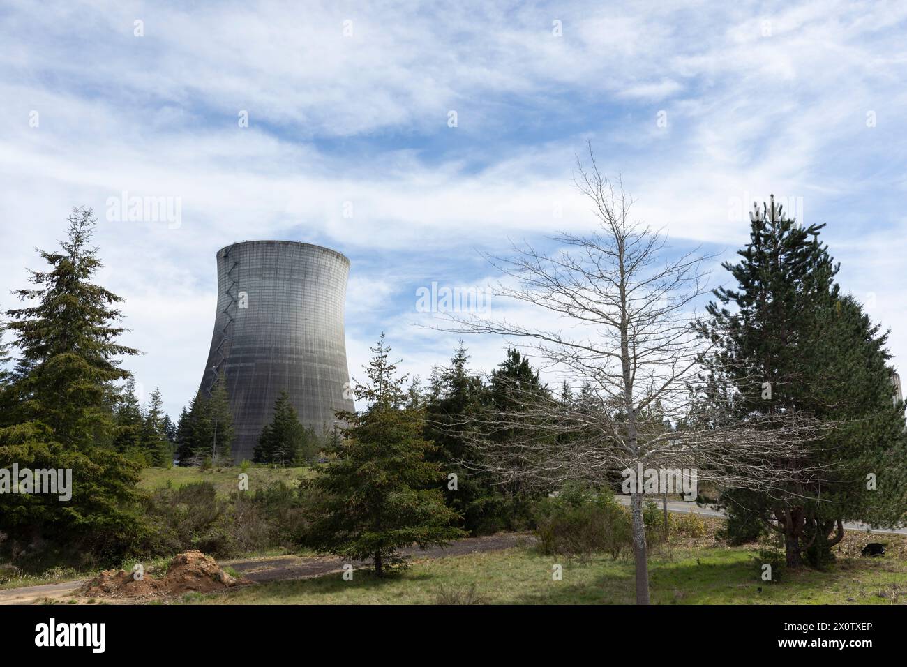 Cooling tower of the decommissioned Satsop Nuclear Power Plant looms ...