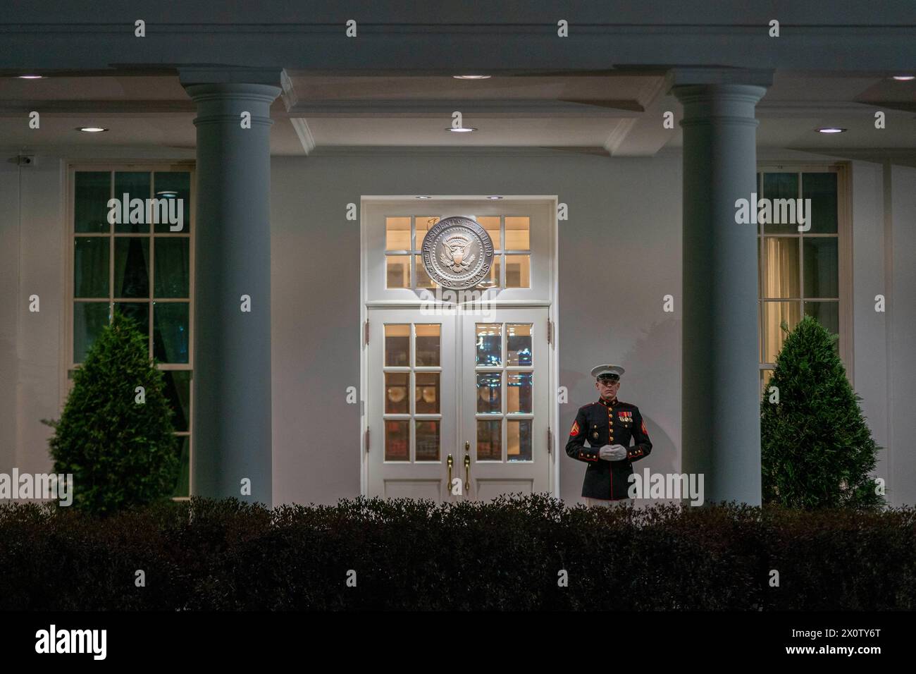 A Marine is posted outside the West Wing entrance of the White House ...