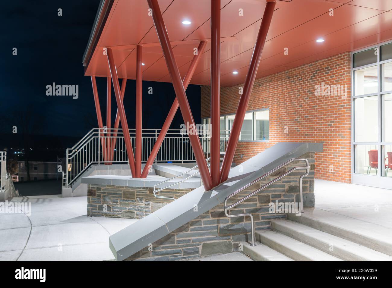 Example of a stainless steel railing along an exterior set of stairs at ...