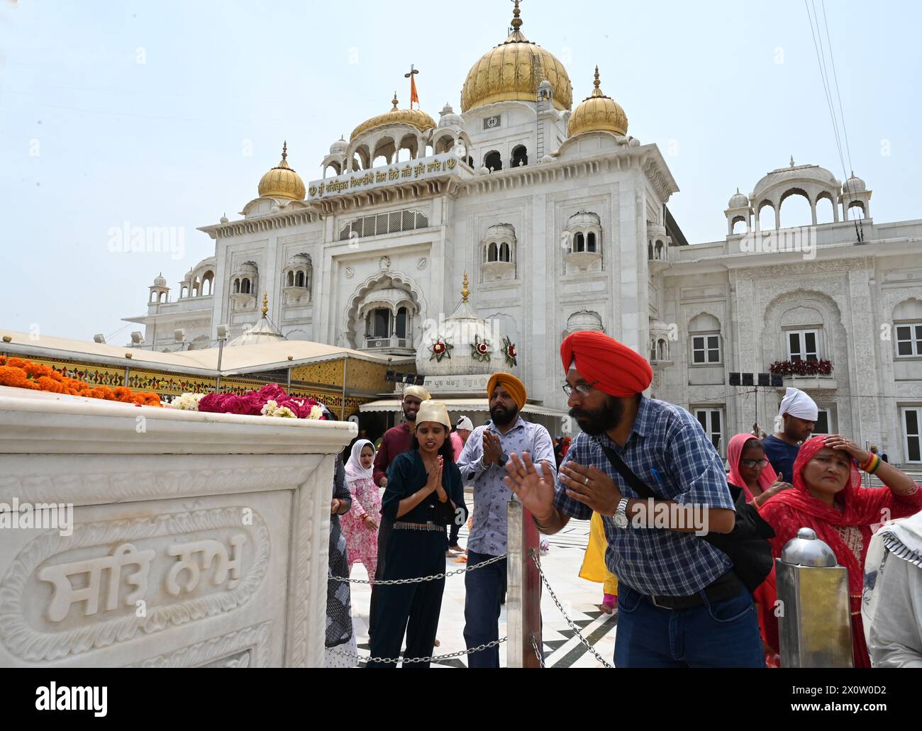 NEW DELHI, INDIA - APRIL 13: Devotees prayer at Gurudwara Bangla Sahib on the occasion of ...