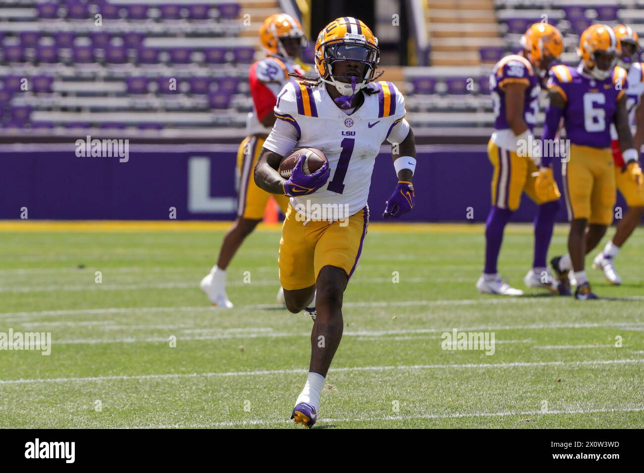 Baton Rouge, LA, USA. 13th Apr, 2024. LSU wide receiver Aaron Anderson (1) returns a kick during ...