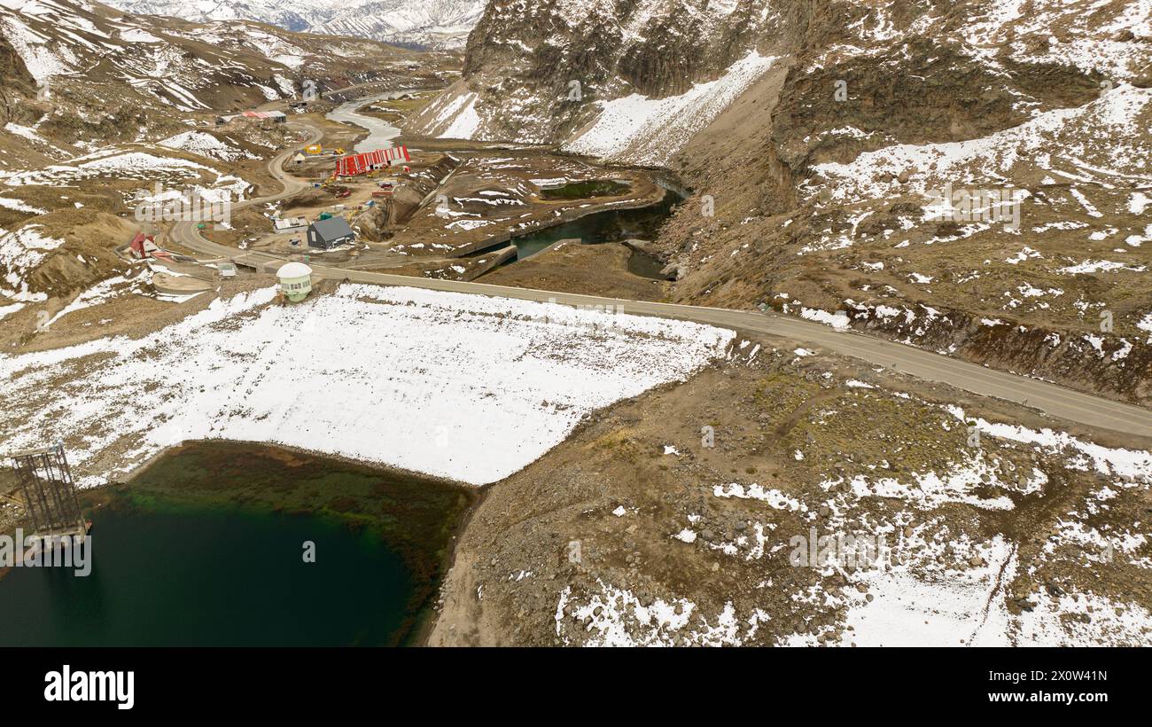 Aerial view of the Snowy Andes and Maule Lagoon at the Pehuenche border ...