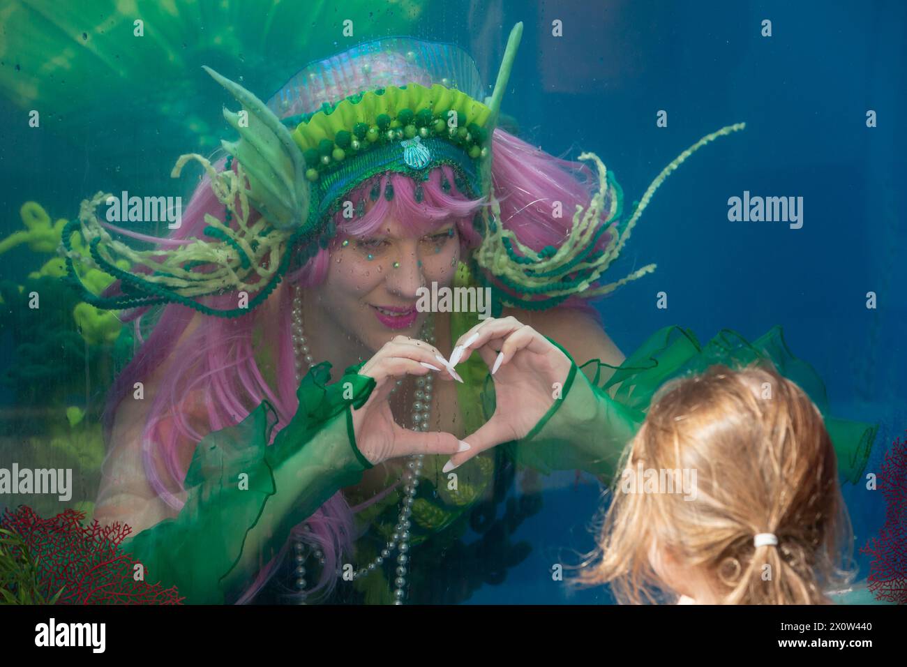 Aberdeen, Washington, USA. 13th April, 2024. Una the Mermaid greets a ...