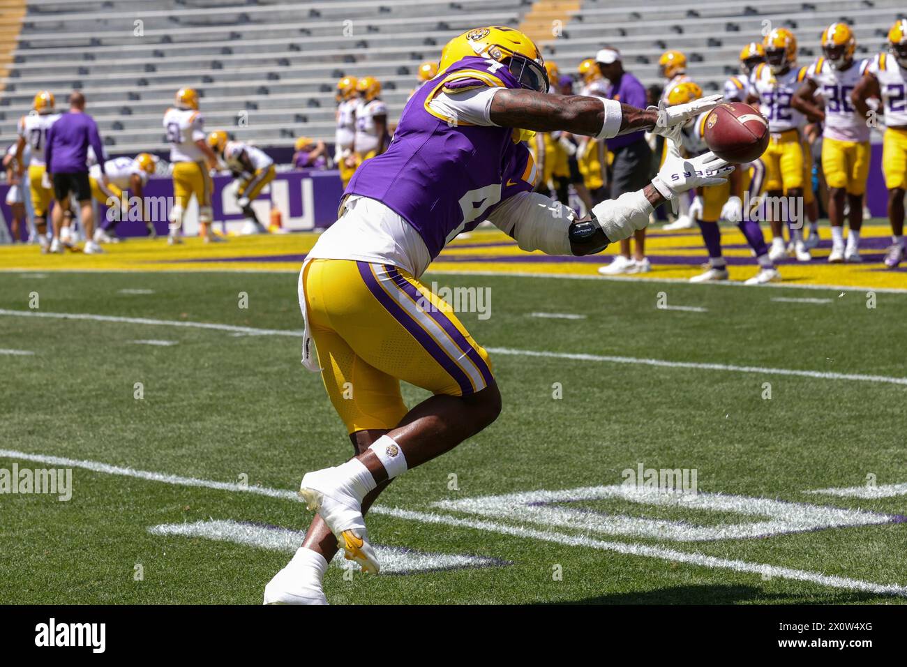 April 13, 2024: LSU linebacker Harold Perkins Jr. (4) goes through ...
