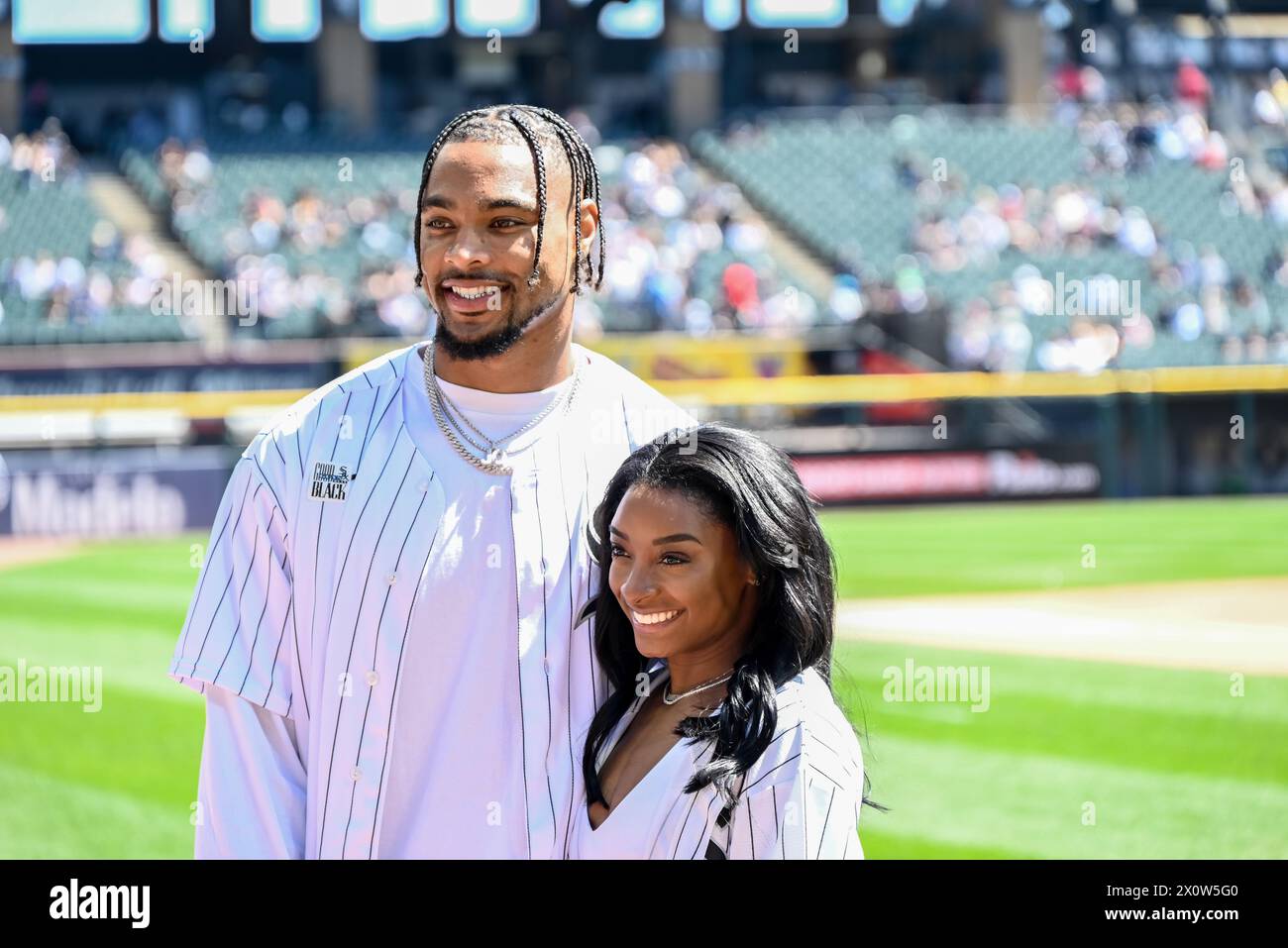 Simone Biles (right) and NFL Chicago Bears' Football Safety Jonathan ...