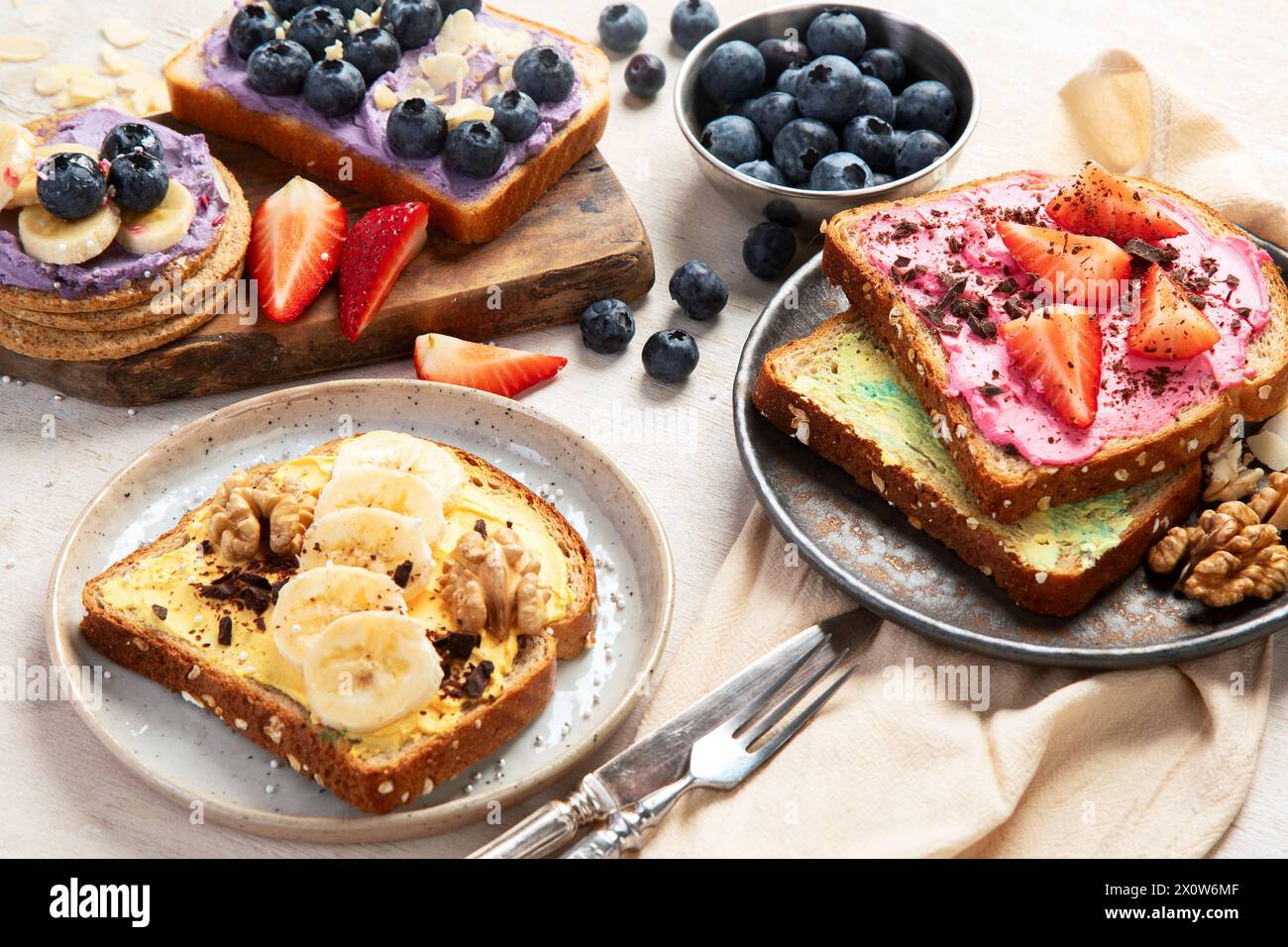 Sweet toast assortment. Banana, cream cheese, peanut butter and ...