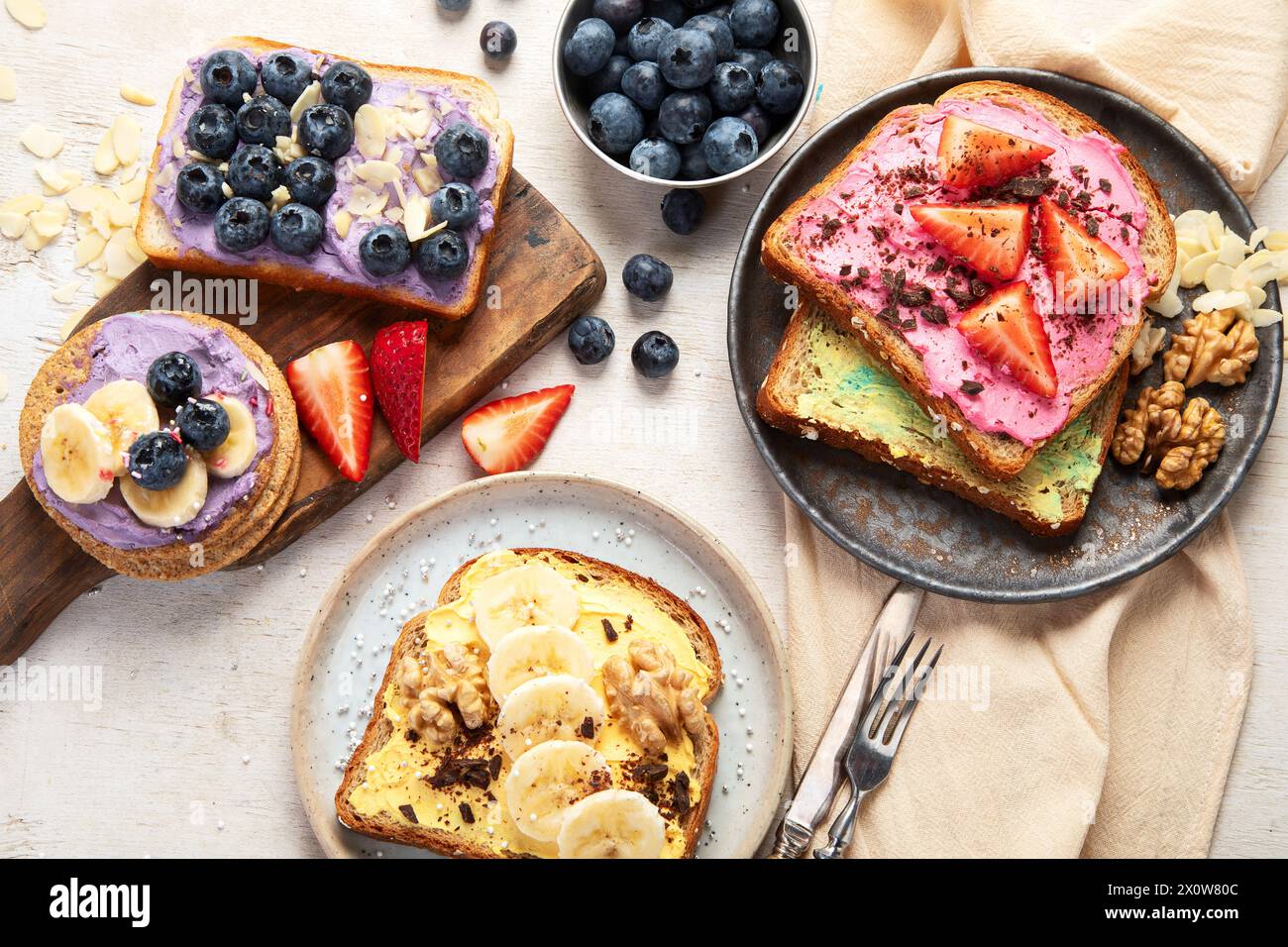Sweet toast assortment. Banana, cream cheese, peanut butter and ...