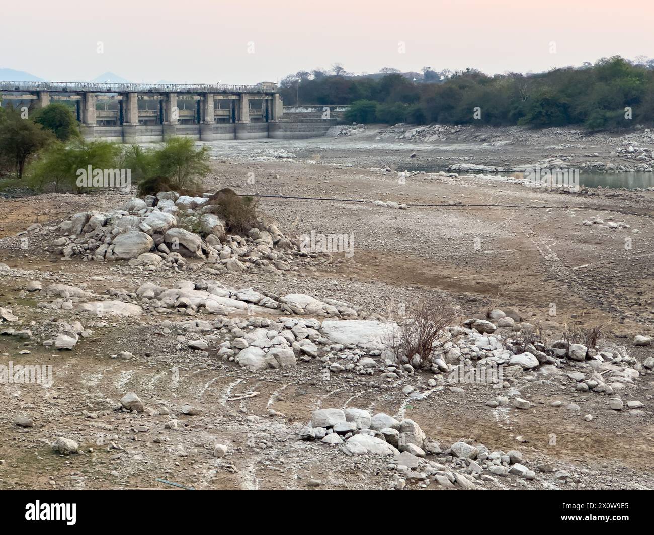 Dry river bed with sluice gates of Sathanur Dam which forms the ...