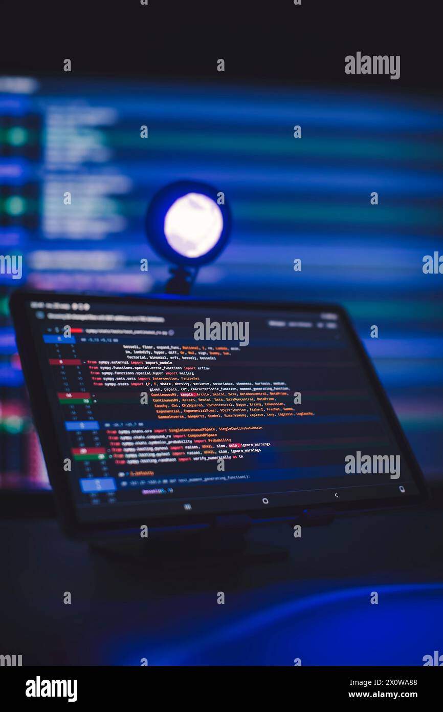 Working atmosphere of a programmer at home, background. Programming code abstract Stock Photo ...