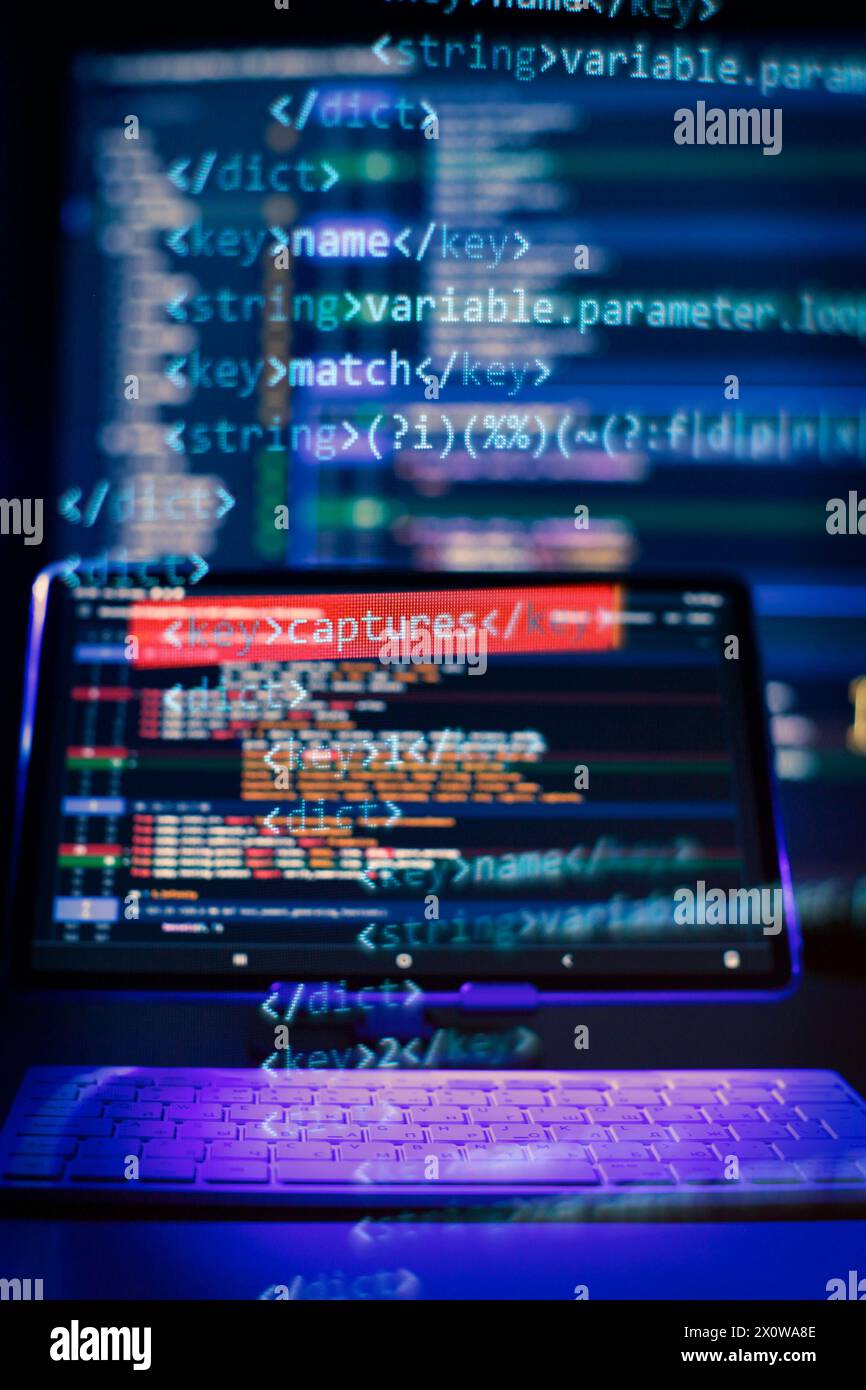 Working atmosphere of a programmer at home, background. Programming code abstract Stock Photo ...