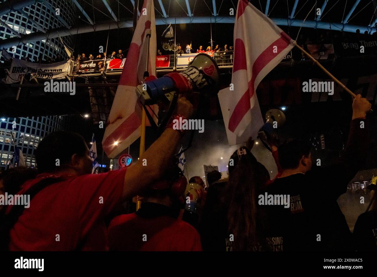 Tel Aviv, Israel. 16th Mar, 2024. Protesters seen on the pedestrian ...