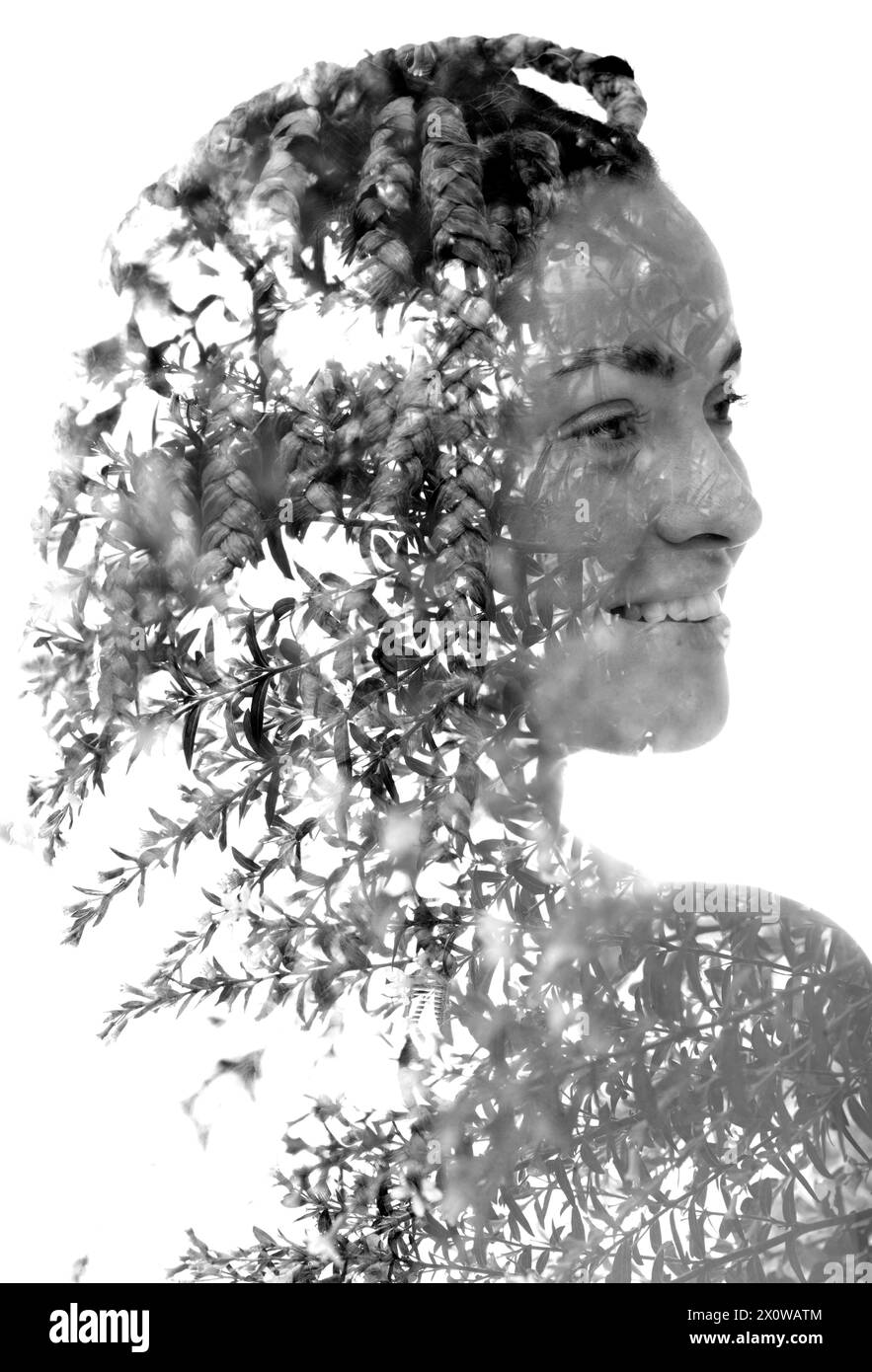 A double exposure female portrait merged with young tree branches photo ...
