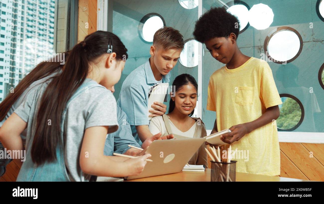 Caucasian teacher giving comment or advise student while smart bot ...