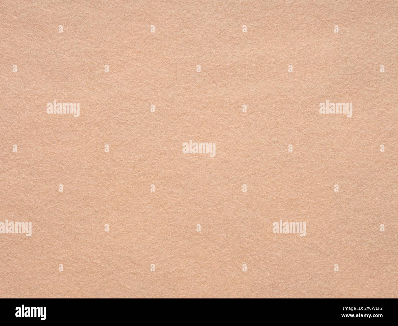 Soft peach felt texture exudes warmth and simplicity, perfect for ...