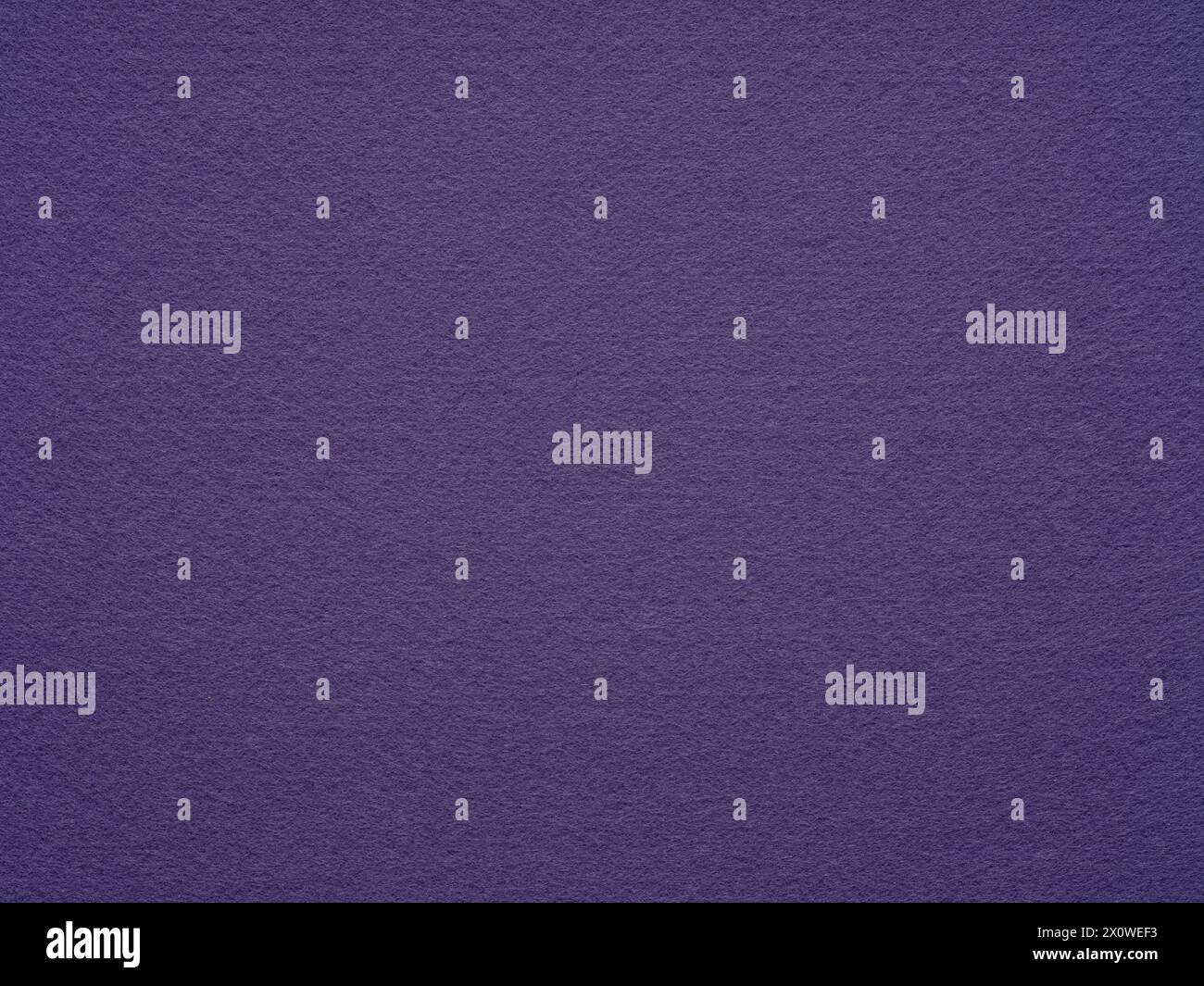 The regal purple felt surface exudes a majestic presence, rich with the ...