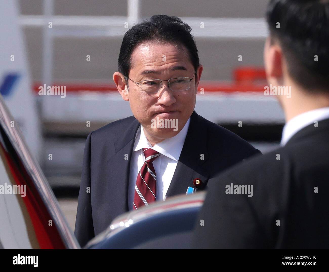 Japanese Prime Minister Fumio Kishida arrives at Haneda International Airport after completing ...