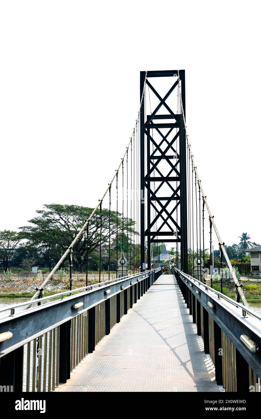 Little Road through metal bridge tunnel over river Stock Photo - Alamy