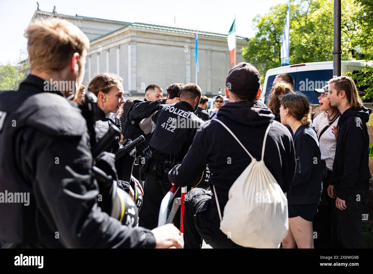 Munich, Germany. 13th Apr, 2024. Counter-Protestor gets removed ...