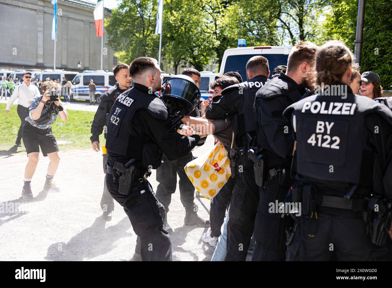 Munich, Germany. 13th Apr, 2024. Counter-Protestor gets removed ...
