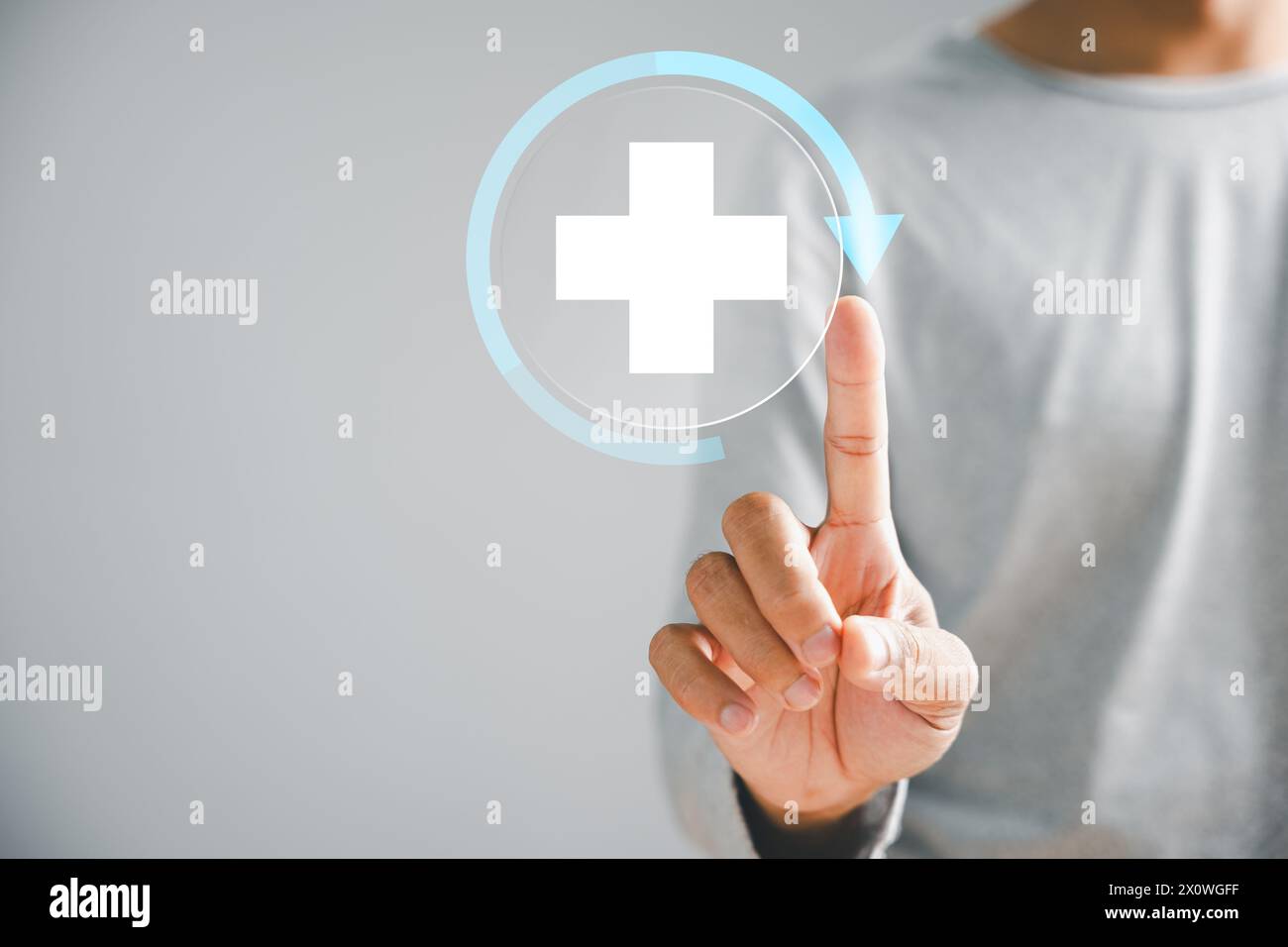 Businessman touching virtual plus sign Stock Photo - Alamy