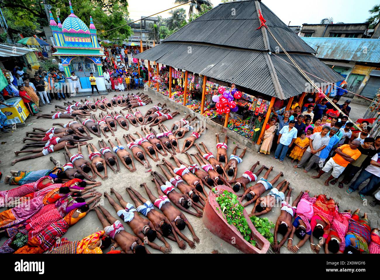 Bagnan, India. 13th Apr, 2024. Large number of Hindu devotees seen laid ...