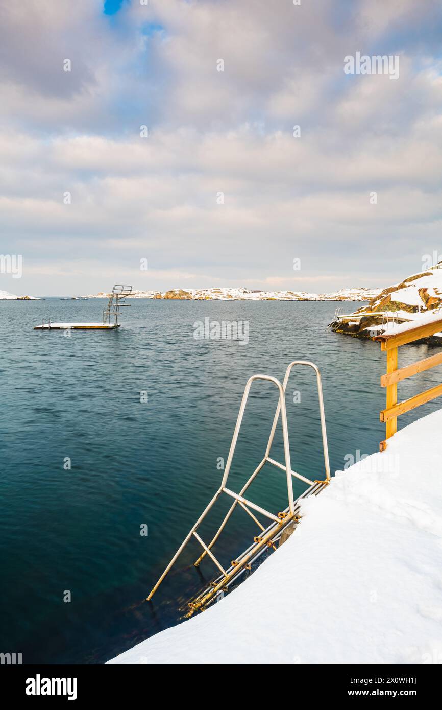 A tranquil seaside scene captures the serenity of winter in Sweden ...