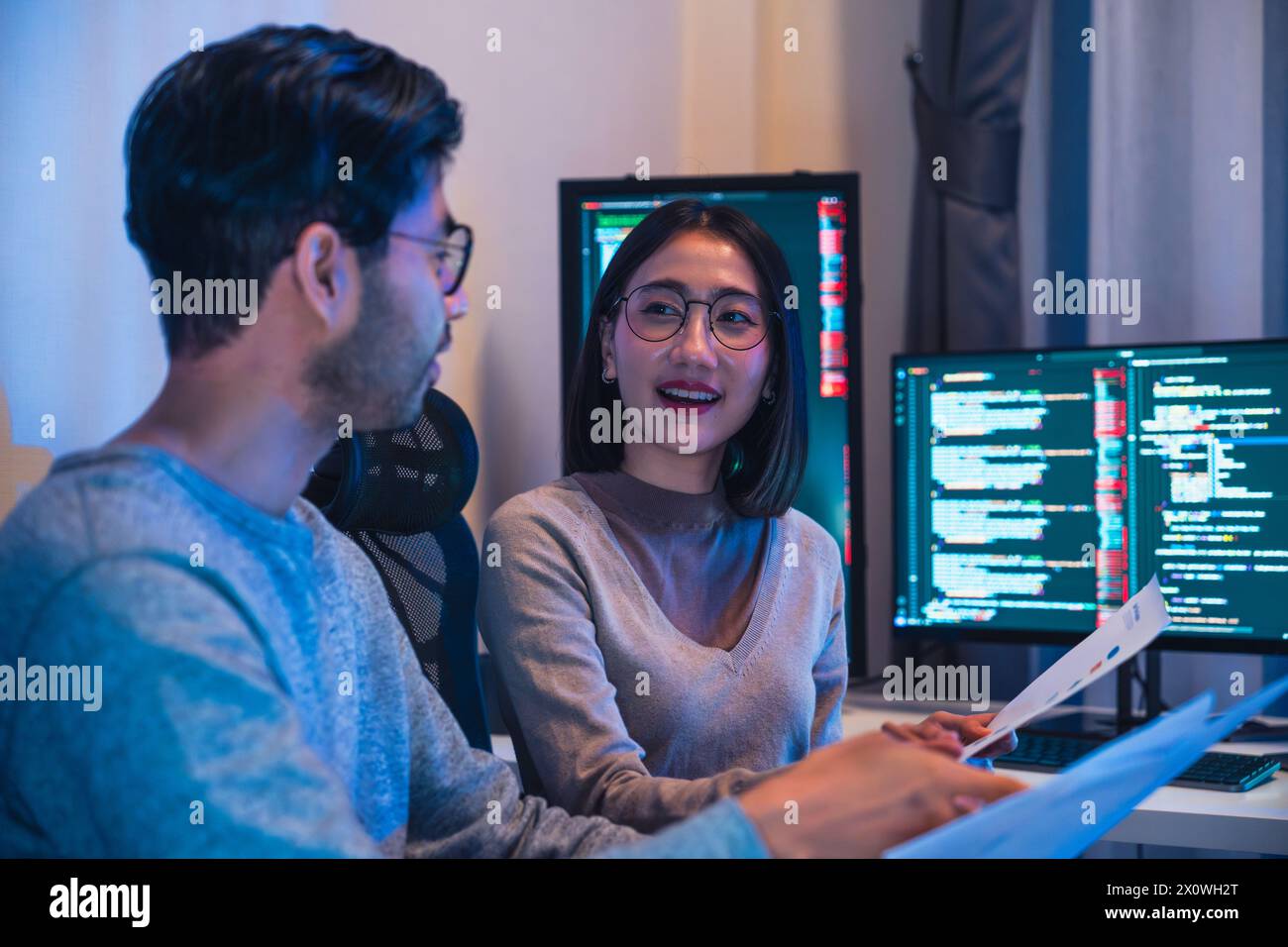 asian and Indian Developer devops team discussion about coding promgram ...