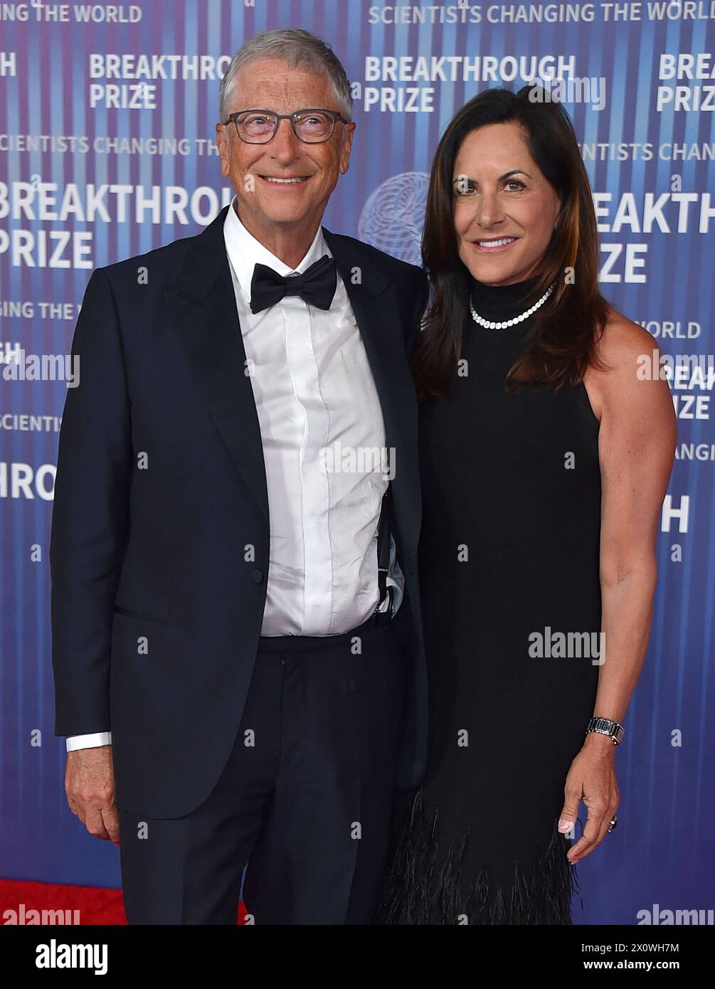 Bill Gates, left, and Paula Hurd arrive at the 10th Breakthrough Prize ...